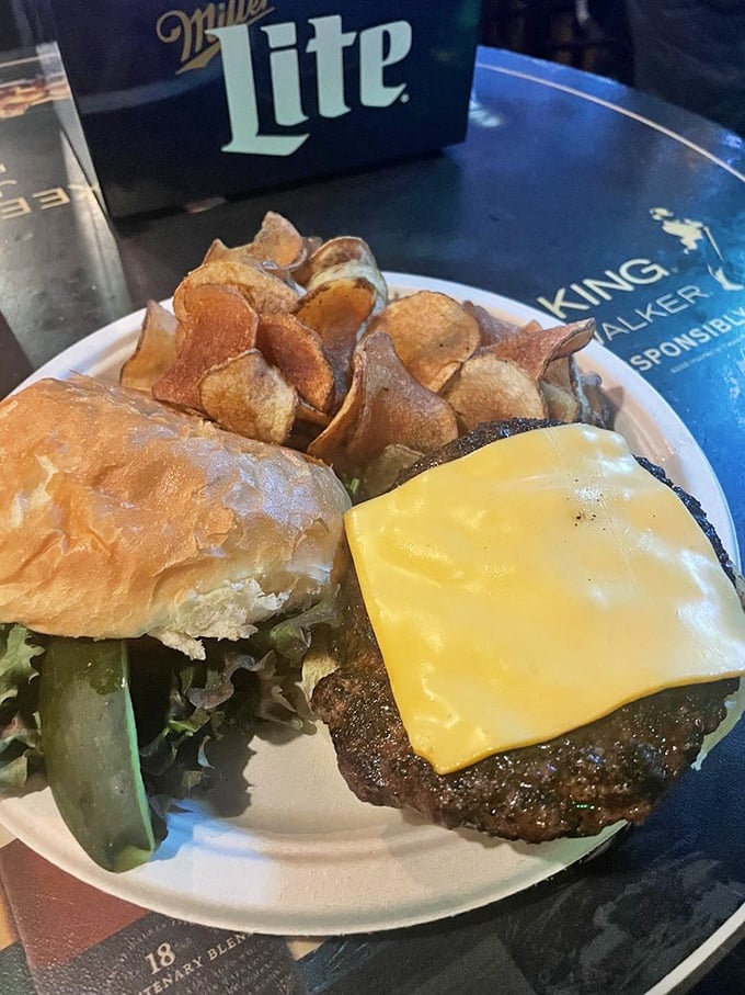 This isn't just a burger—it's a statement. Golden-crisp house-made chips and that perfectly melted cheese tell you someone in the kitchen actually cares.