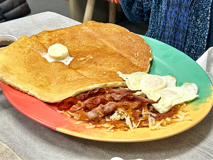 Behold the legendary buttermilk pancake - a breakfast monument that makes regular pancakes look like appetizers.