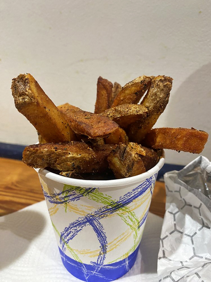 Golden-brown Cajun fries that could make a Louisiana native weep with joy. Crispy outside, fluffy inside—the potato's highest calling.