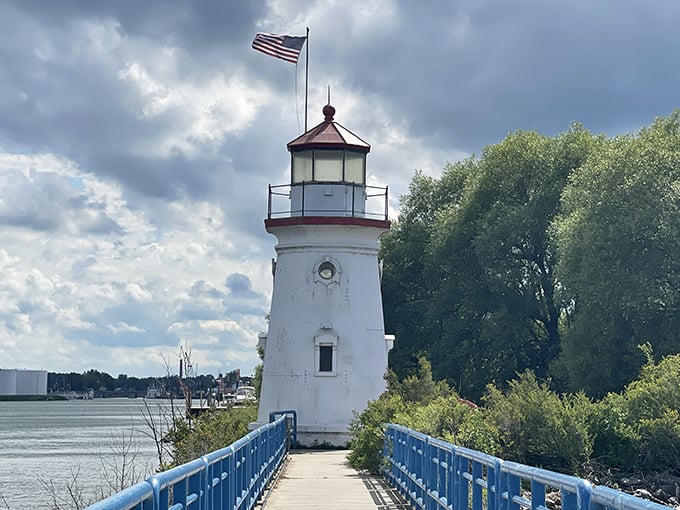 Standing sentinel since 1884, Cheboygan's lighthouse doesn't just guide ships—it guides photographers to the perfect Michigan postcard moment.