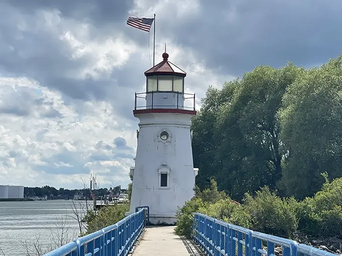 Standing sentinel since 1884, Cheboygan's lighthouse doesn't just guide ships—it guides photographers to the perfect Michigan postcard moment.