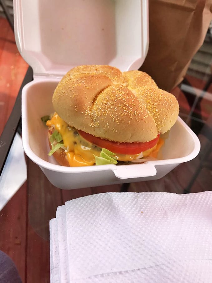 This isn't just a cheeseburger – it's edible poetry with melty American cheese playing the starring role.