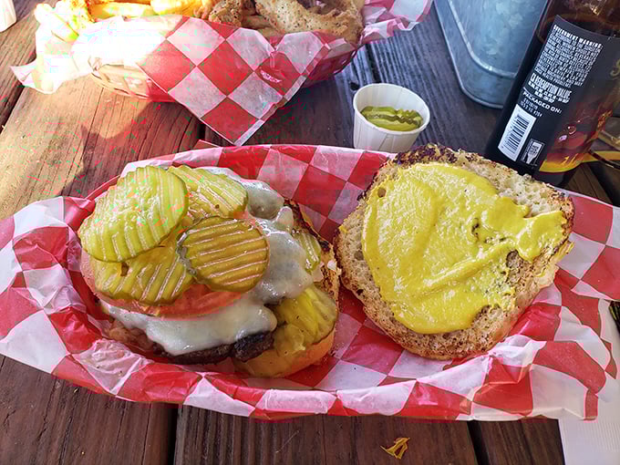 Behold the burger that launched a thousand road trips. Those griddle-kissed pickles and melted cheese demand a moment of reverent silence.
