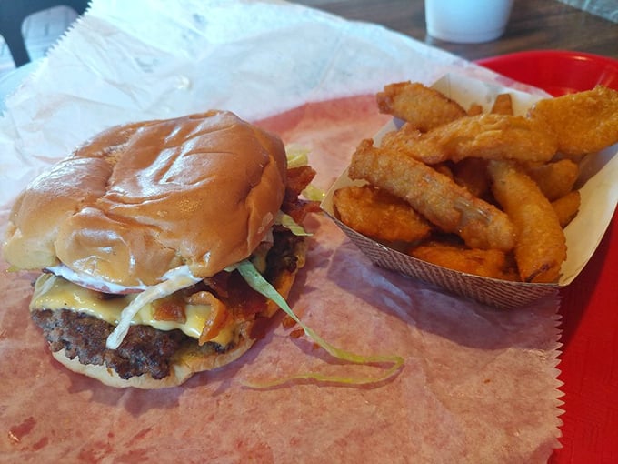 Behold the star of the show: a perfectly crafted cheeseburger that makes fancy $20 gourmet versions seem like unnecessary overachievers.