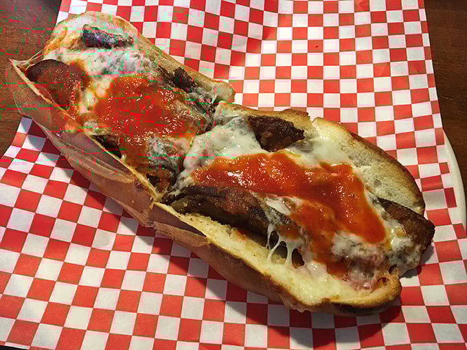 This isn't just a cheesesteak—it's a masterclass in sandwich architecture. The sauce-to-meat-to-cheese ratio would make Frank Lloyd Wright weep with joy.