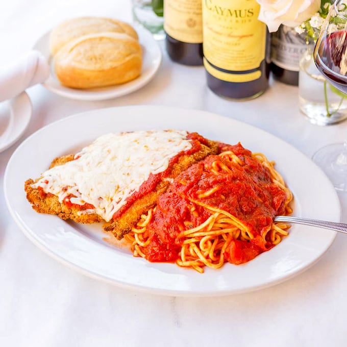 Half chicken parm, half pasta—all happiness. This plate doesn't just feed your body; it feeds memories of every Italian grandmother you wish you had.