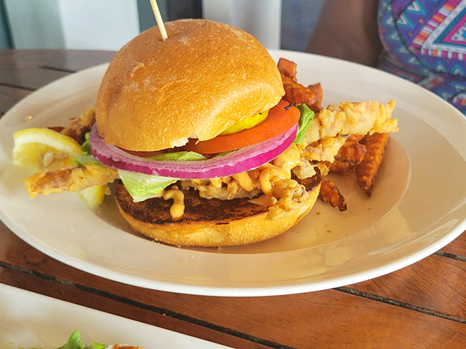 The star of the show arrives! This isn't just a chicken sandwich—it's an architectural masterpiece of crispy goodness, fresh veggies, and that mysteriously addictive sauce.