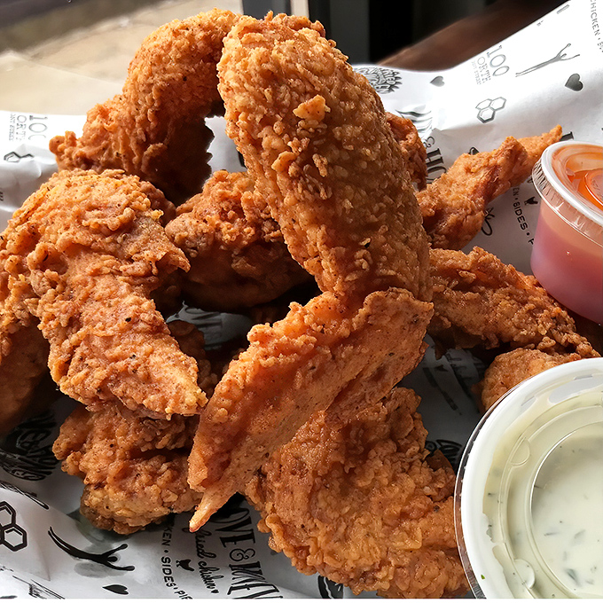 Golden-brown wings with a crust that shatters like glass, served with dipping sauces that make you question your lifelong condiment loyalties.