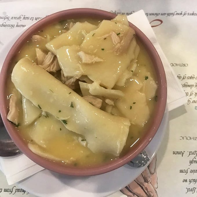 This chicken pot pie isn't the puff-pastry-topped creation city folks expect—it's pure Pennsylvania Dutch comfort with hand-rolled noodles swimming in savory broth.