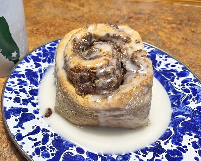 The cinnamon roll that launched a thousand road trips. This spiral of sugary perfection isn't just breakfast—it's an event worthy of its own zip code.
