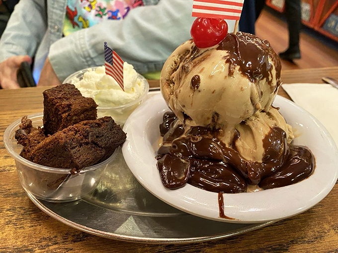 This isn't just ice cream with hot fudge—it's therapy in a dish, complete with brownie reinforcements standing by.