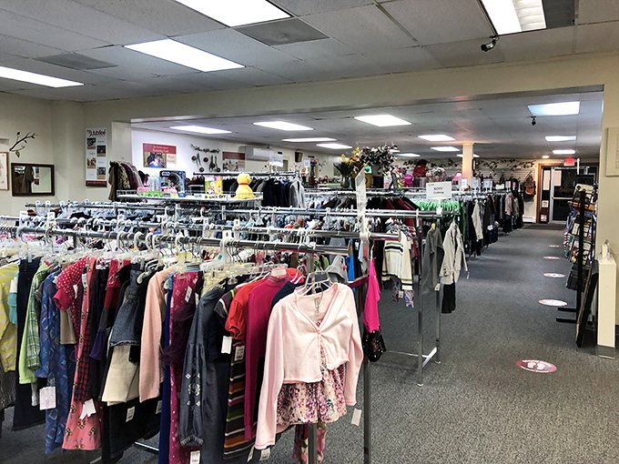 Clothing racks stretch endlessly, offering fashion possibilities that span decades of style and sophistication.