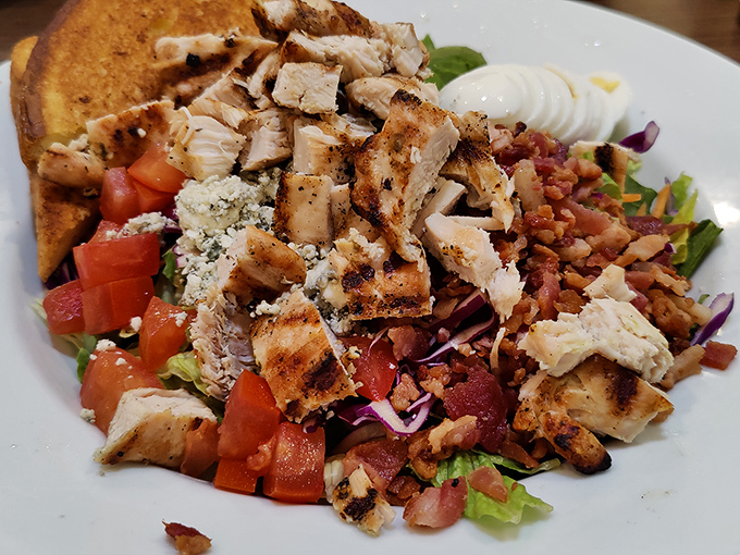 This Cobb salad isn't just arranged—it's choreographed. A protein-packed dance of chicken, bacon, and blue cheese that Fred Astaire would applaud.