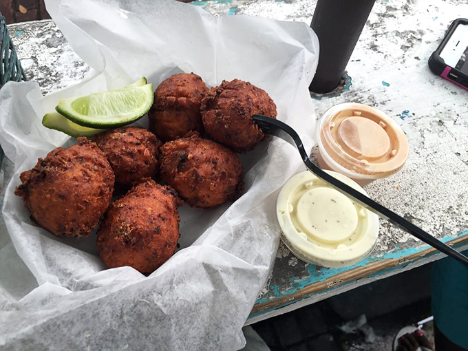 Golden orbs of joy that make grown adults fight over the last one. The lime wedge isn't just garnish – it's an essential supporting actor.
