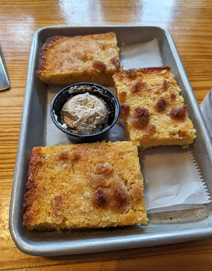 Three squares of heaven arrive with butter, because sometimes perfection needs a dance partner to truly shine.