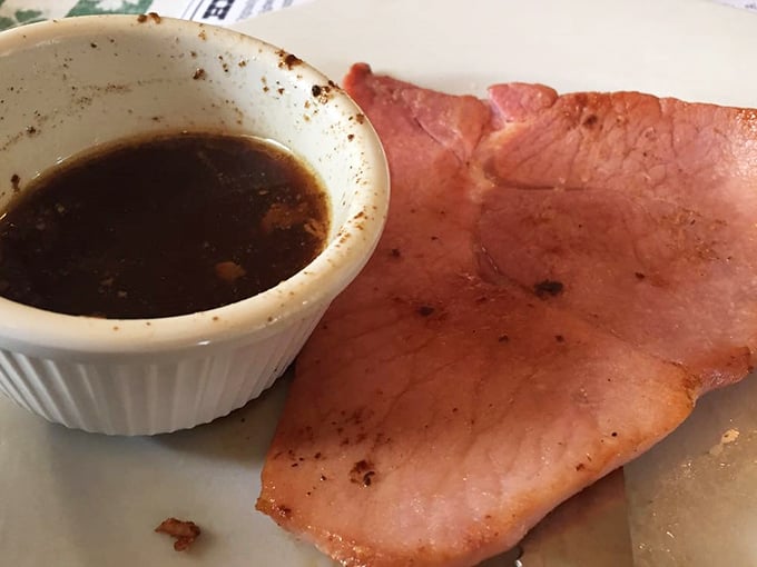 Red eye gravy – that magical elixir of ham drippings and coffee – alongside country ham so thin you could read yesterday's newspaper through it.