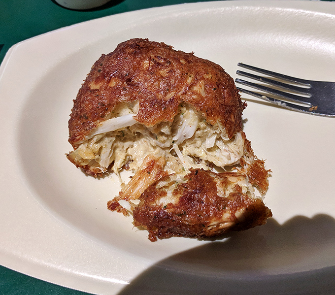 Behold the star attraction: a golden-brown crab cake that's more crab than cake—the kind that makes Marylanders misty-eyed with hometown pride.