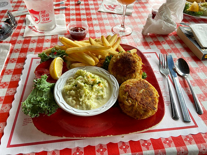 Golden-brown perfection that makes you understand why Marylanders get misty-eyed talking about crab cakes. These aren't just lunch—they're an edible state treasure.