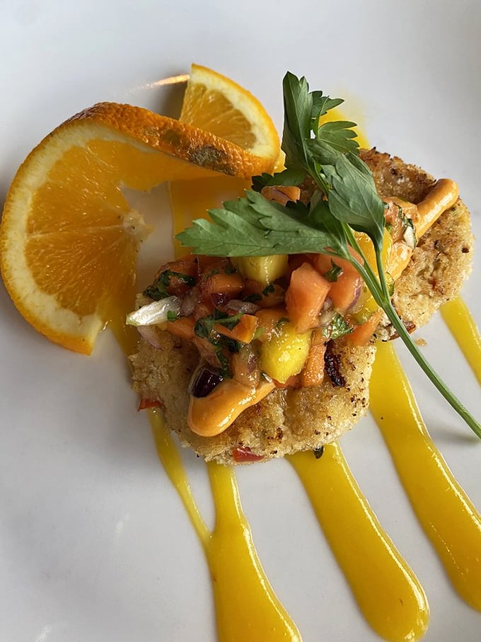 This isn't just a crab cake; it's edible architecture with mango salsa and citrus sauce that makes your taste buds perform a standing ovation.