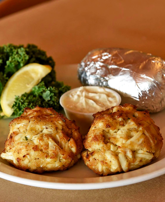 Golden-brown perfection that's more crab than cake—these lumpy beauties are what seafood dreams are made of.
