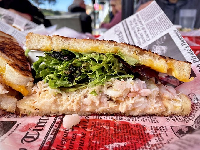 This isn't just a sandwich; it's a Bodega Bay masterpiece where sweet crab meat, fresh greens, and toasted sourdough create perfect harmony.