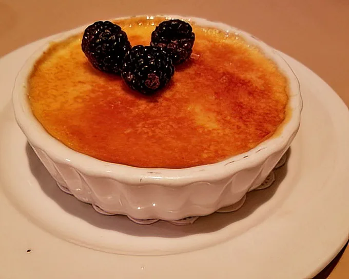 The star of our show: a crème brûlée with a sugar crust so perfectly torched it makes that signature "crack" sound that's music to dessert lovers' ears.