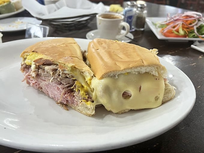 The Cuban sandwich here isn't just a meal, it's an engineering marvel. Layers of ham, pork, cheese, and pickles pressed into handheld perfection.