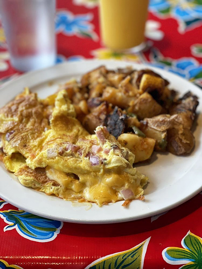 Cheese oozing from a perfectly executed Denver omelette meets crispy potatoes in a morning marriage made in heaven.
