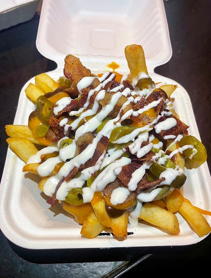 Disco Fries that make you want to do the hustle. Crispy potatoes, melty cheese, bacon bits, and jalapeños performing a flavor dance party.