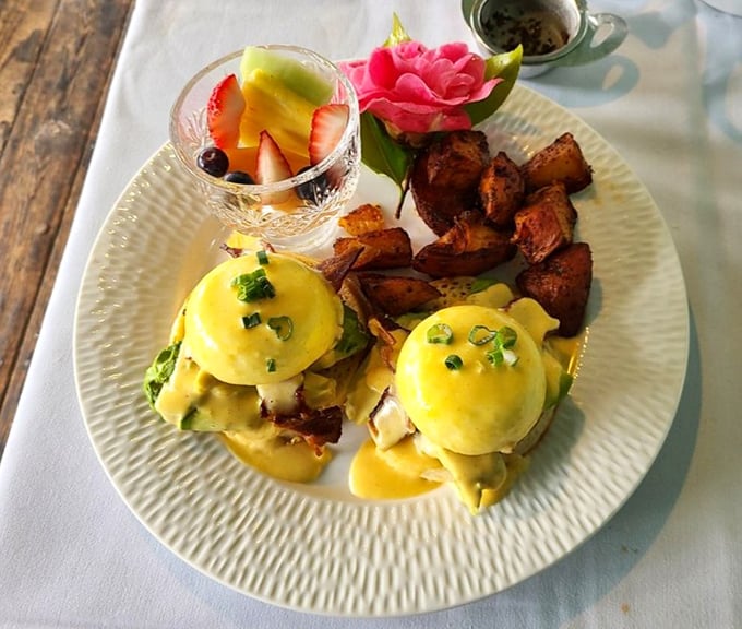 Eggs Benedict elevated to art form status. That hollandaise sauce doesn't just flow—it performs a silky ballet across perfectly poached eggs.