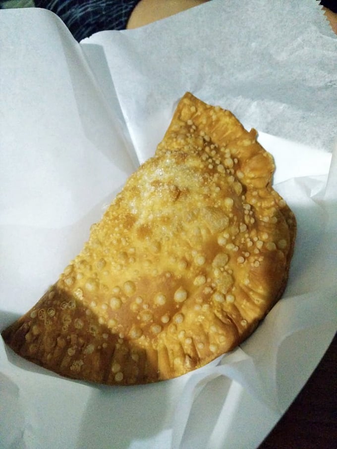 The golden-fried pastel isn't just an empanada—it's a crispy pocket of joy that shatters with each bite, revealing a filling that would make your grandmother jealous.
