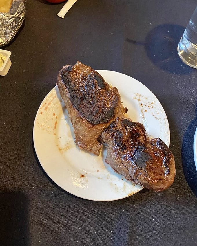 Behold the filet mignon in its natural habitat—perfectly seared outside, gloriously pink inside, and worth every carnivorous minute.