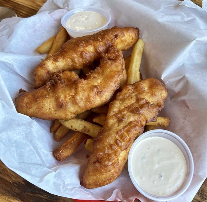 Golden-battered fish that would make Neptune himself weep with joy, paired with fries that achieve that perfect crisp-to-fluffy ratio.