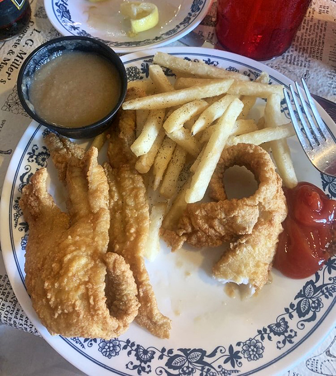 Golden, crispy perfection that makes fish skeptics into believers. This isn't just fried fish—it's edible sunshine with a side of nostalgia.
