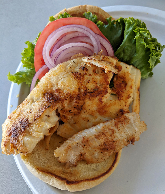 This blackened fish sandwich isn't just lunch—it's what the Florida Keys tastes like when served on a bun.