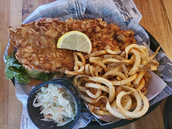 Lake Erie's finest moment: golden-battered fish that shatters with each bite, paired with curly fries that could make a French chef weep with joy.