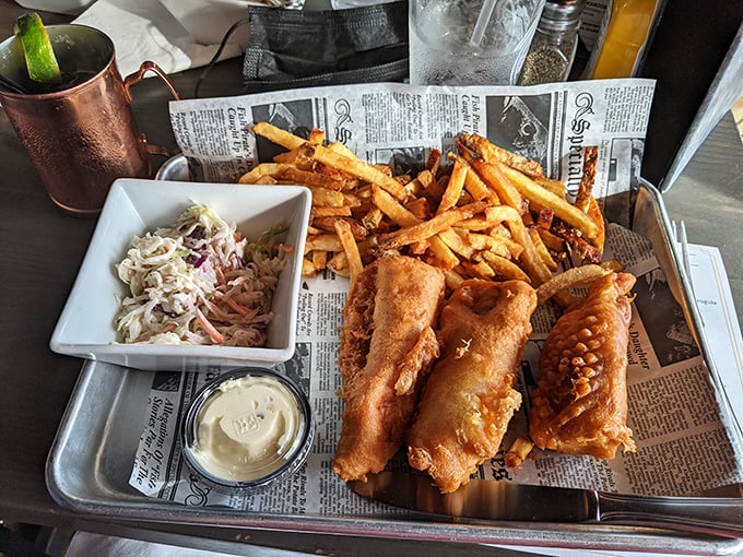 Golden-battered fish that shatters with each bite, served with hand-cut fries and creamy slaw—this is what fish and chips dreams are made of.
