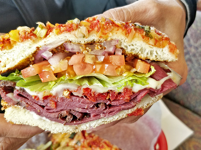 This isn't just a sandwich; it's edible architecture—layers of pastrami, fresh vegetables, and cheese nestled between focaccia that deserves its own California historical landmark status.