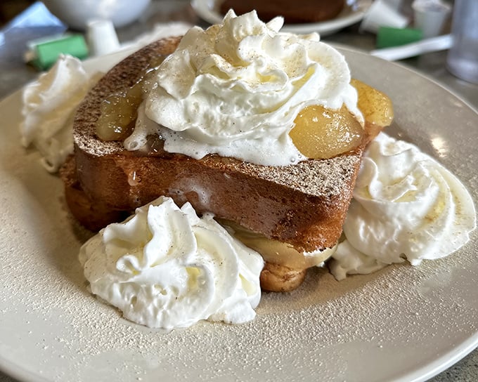 This isn't just French toast – it's a cinnamon-dusted cloud with apple filling that makes you wonder if breakfast should actually be classified as dessert.