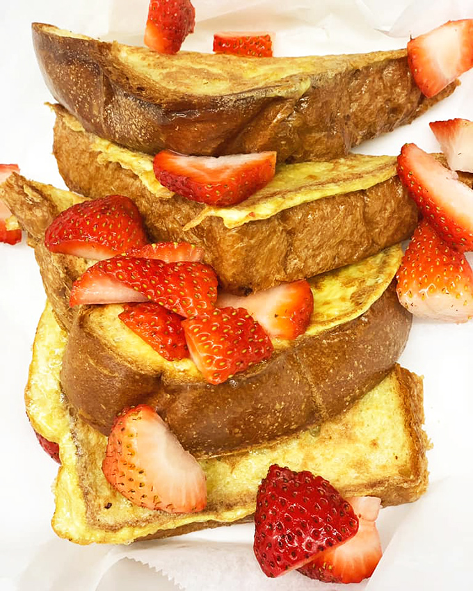 This French toast doesn't just have strawberries—it's having a full-blown berry celebration that your taste buds are cordially invited to attend.