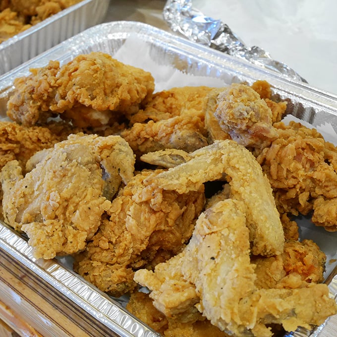 Golden-brown perfection that makes Colonel Sanders look like an amateur. This fried chicken doesn't just set the bar—it is the bar.