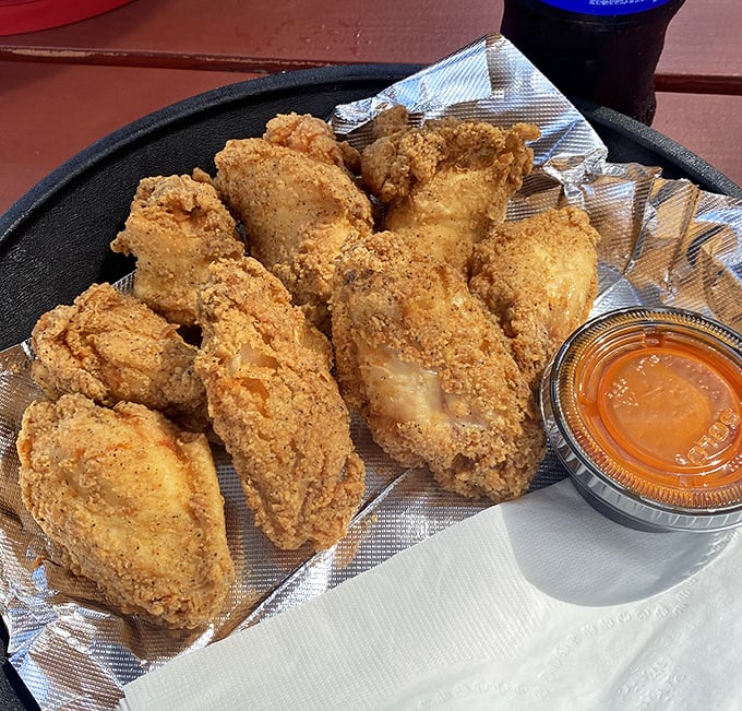 Golden-brown perfection that makes other fried chicken look like it's not even trying. That crunch should have its own soundtrack.