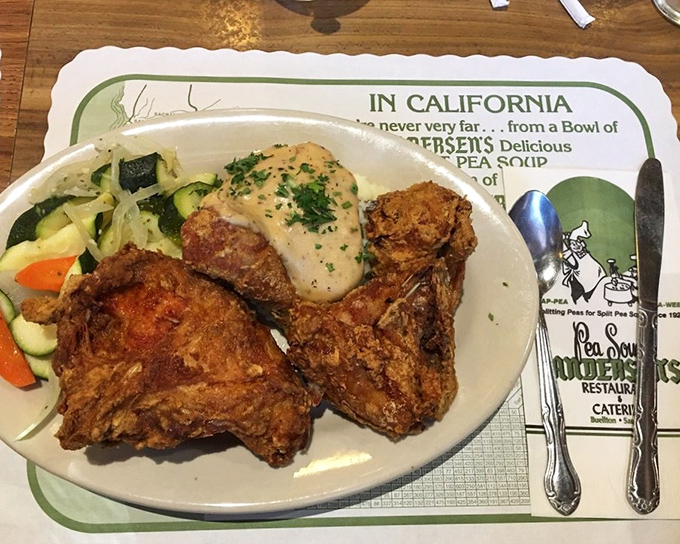Golden-brown perfection on a plate! This fried chicken has the kind of crackling crust that makes you want to text your cardiologist, "Worth it."