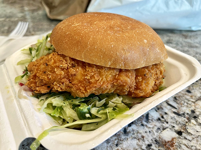 Behold the star of the show—a buttermilk fried chicken sandwich that makes other sandwiches question their life choices.