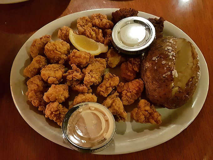 Golden-fried shrimp that would make Hemingway put down his drink and pick up a fork. The baked potato isn't just a side—it's a necessity.