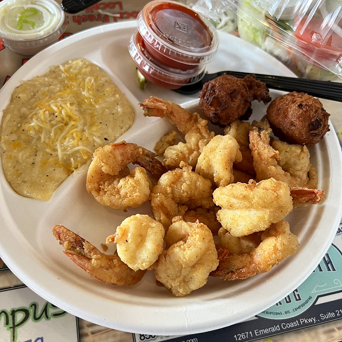 Golden-battered shrimp that snap with freshness, alongside cheese grits that would make a Southerner weep with joy. This is what vacation memories are made of.
