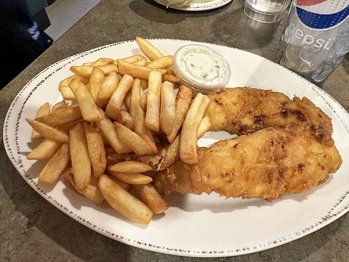 Golden-fried walleye that would make any Midwesterner misty-eyed. Crispy on the outside, flaky on the inside, with fries that demand to be savored one by one.