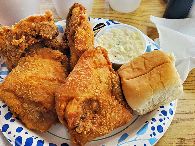 Golden-brown perfection on a plate – this chicken's crackling exterior gives way to juicy meat that might just ruin you for all other fried chicken.