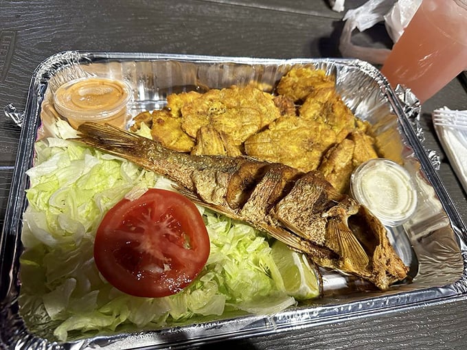 This isn't just fried snapper—it's Florida's answer to soul food, served with enough crispy tostones to make your diet plan weep.