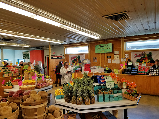 Farm-fresh produce takes center stage in this colorful corner of the marketplace. Pineapples stand tall among apples and potatoes, bringing tropical flair to Pennsylvania palates.